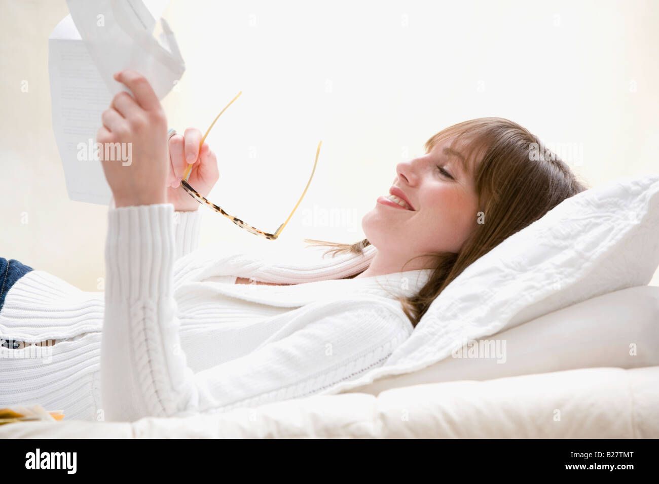 Woman reading mail Stock Photo - Alamy