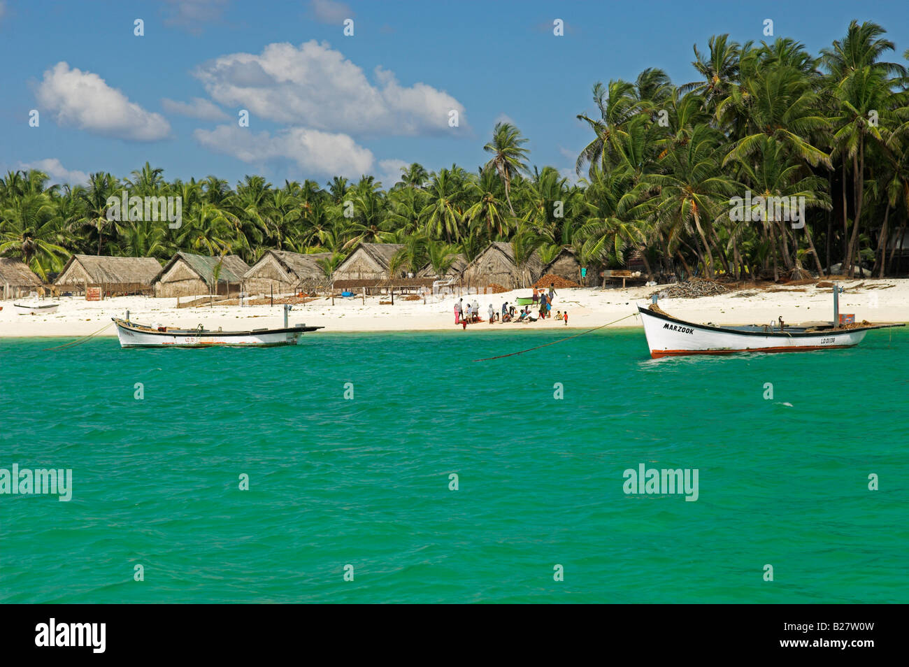 Island of Agatti India with beach fisherman boats and thatched huts ...