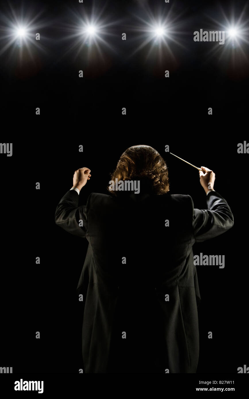 Man under spotlight hi-res stock photography and images - Alamy