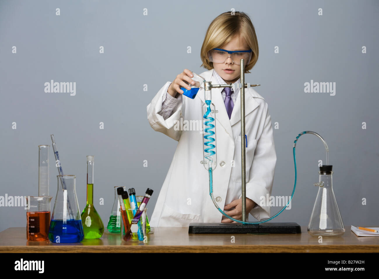 Boy performing science experiment Stock Photo - Alamy