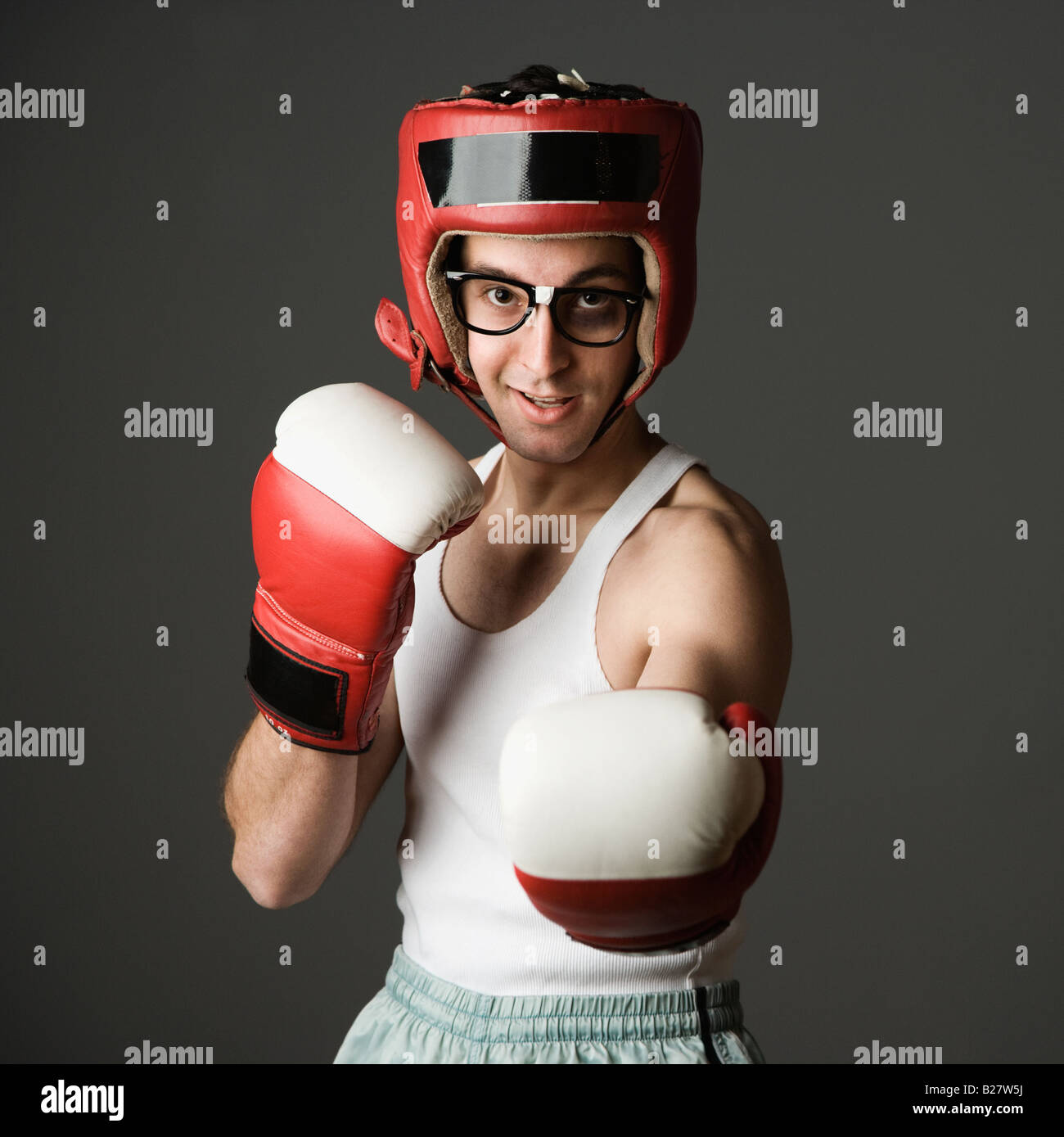 Nerdy man boxing Stock Photo - Alamy