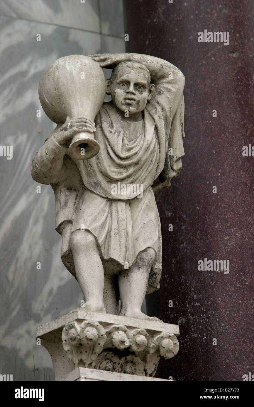 Statue of a monk with a wine ewer on the side of St Mark s basilica ...