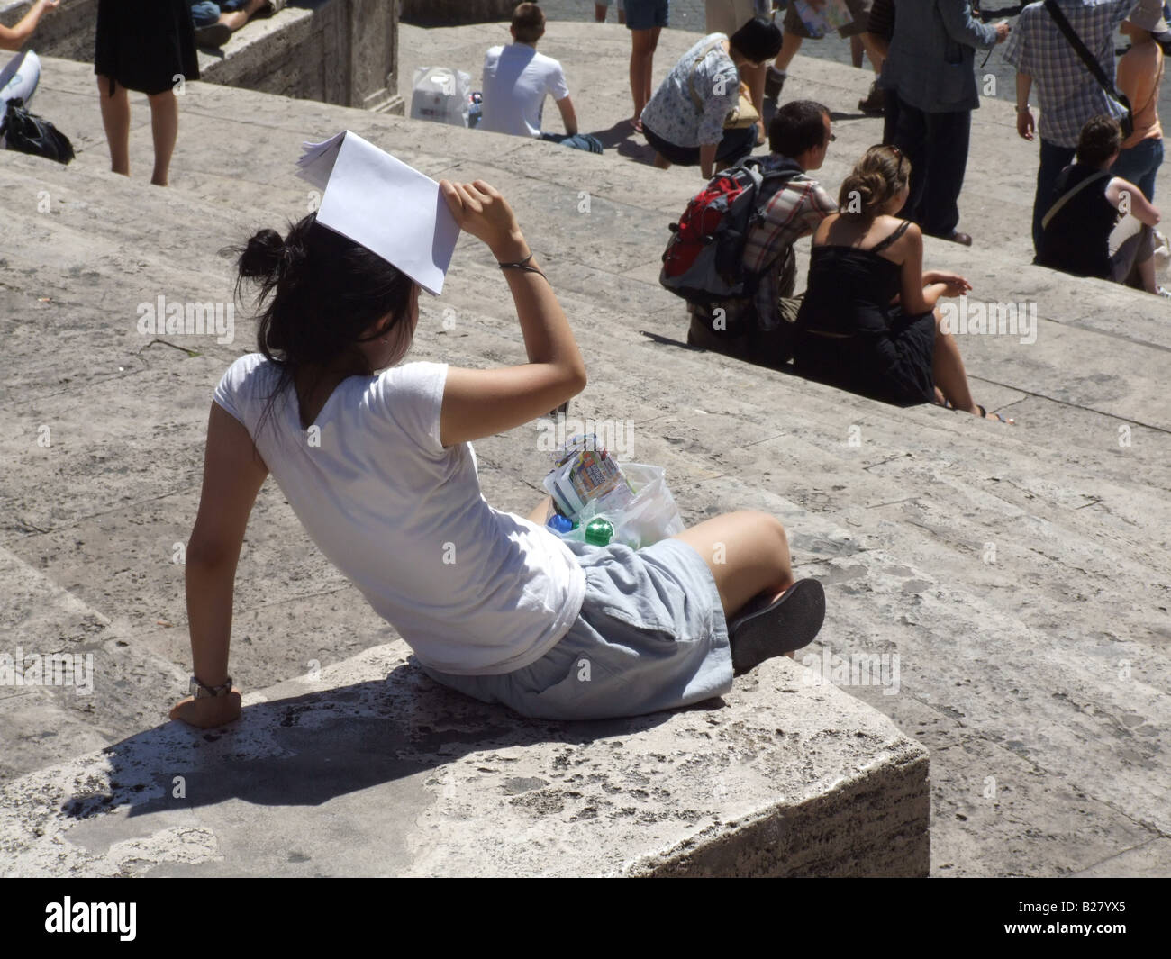 Young teen couple sitting on spanish steps hi-res stock photography and ...