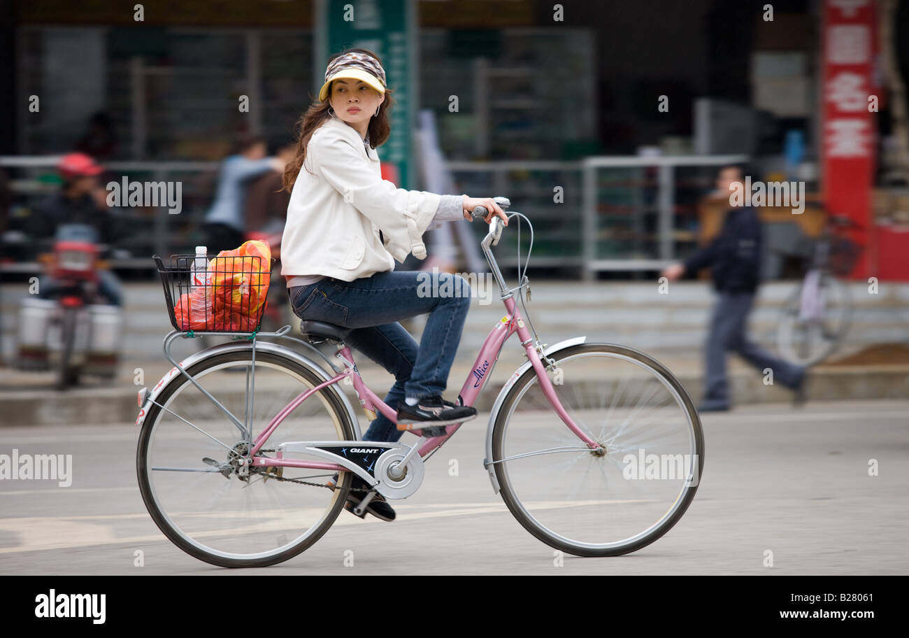 Teenager cycling china hi-res stock photography and images - Alamy