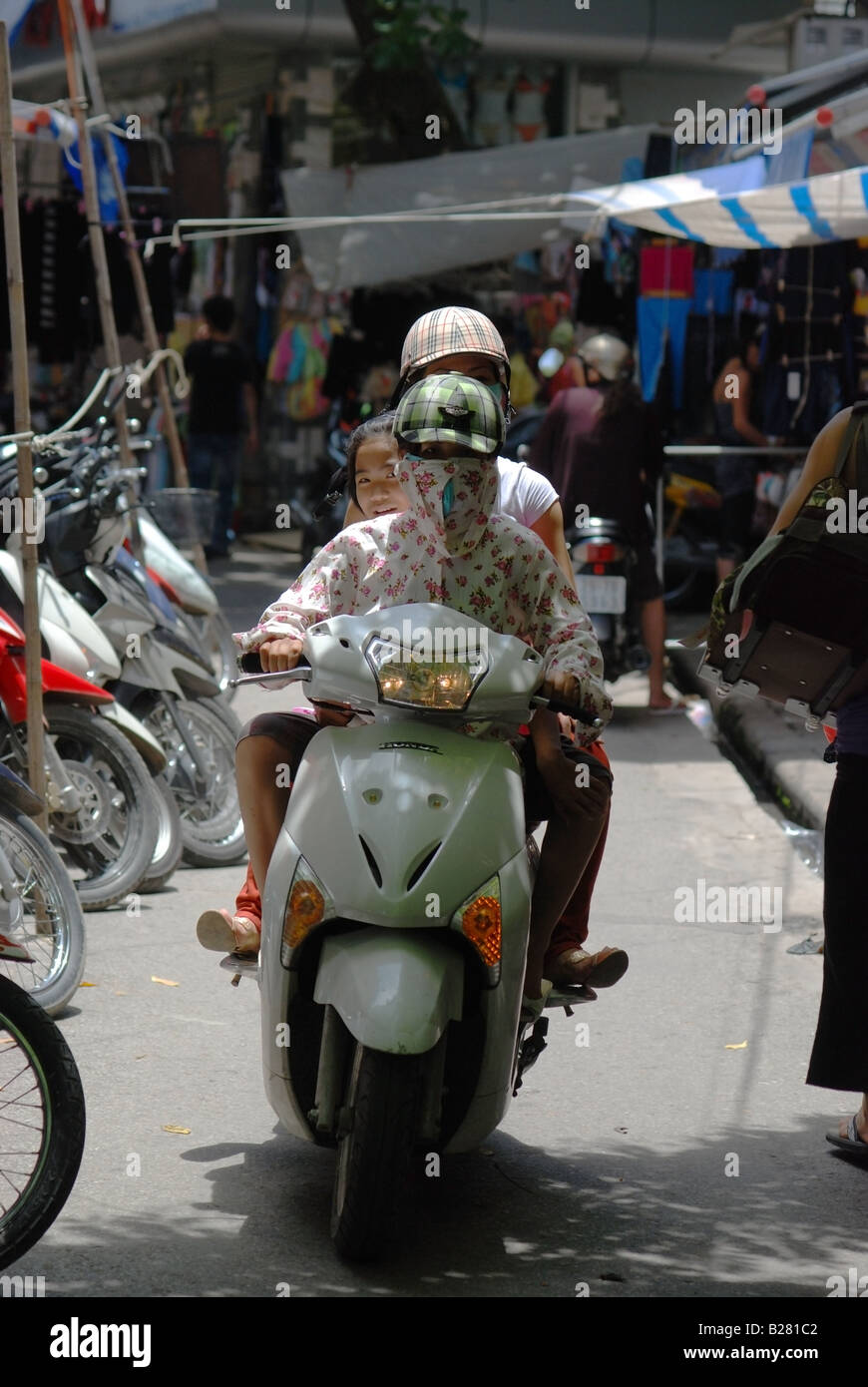Vietnamese girl on scooter hi-res stock photography and images - Alamy