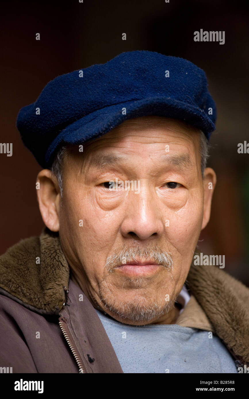 Chinese man in Fuli Old Town Xingping China Stock Photo - Alamy