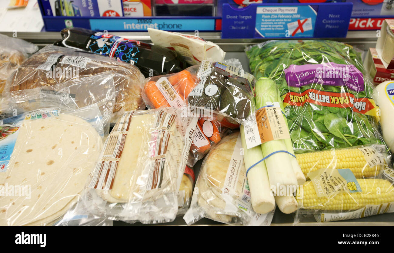 Food on the check out belt at a Tesco superstore in Central London 2008 ...