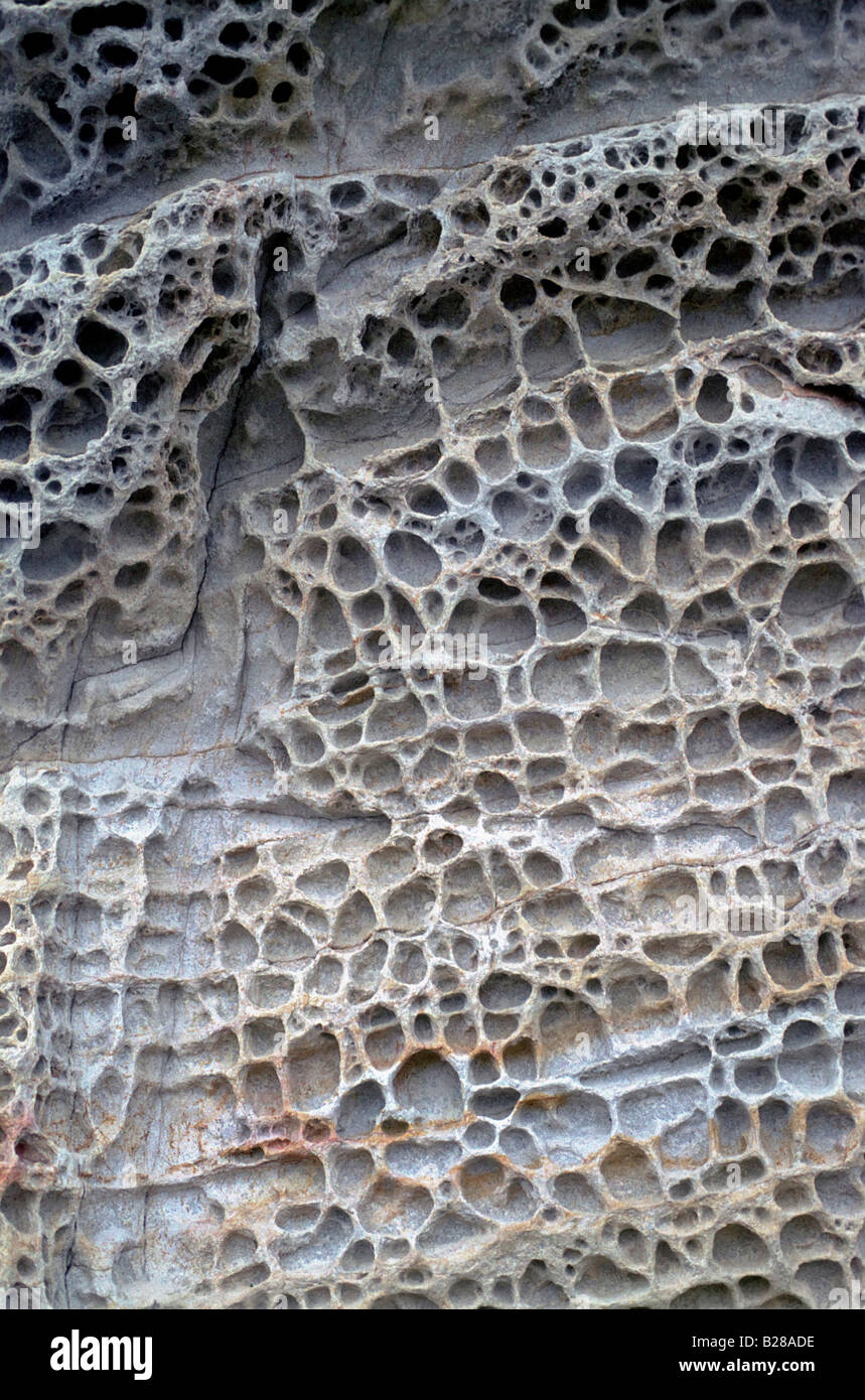 Eroding sandstone cliff Stock Photo - Alamy