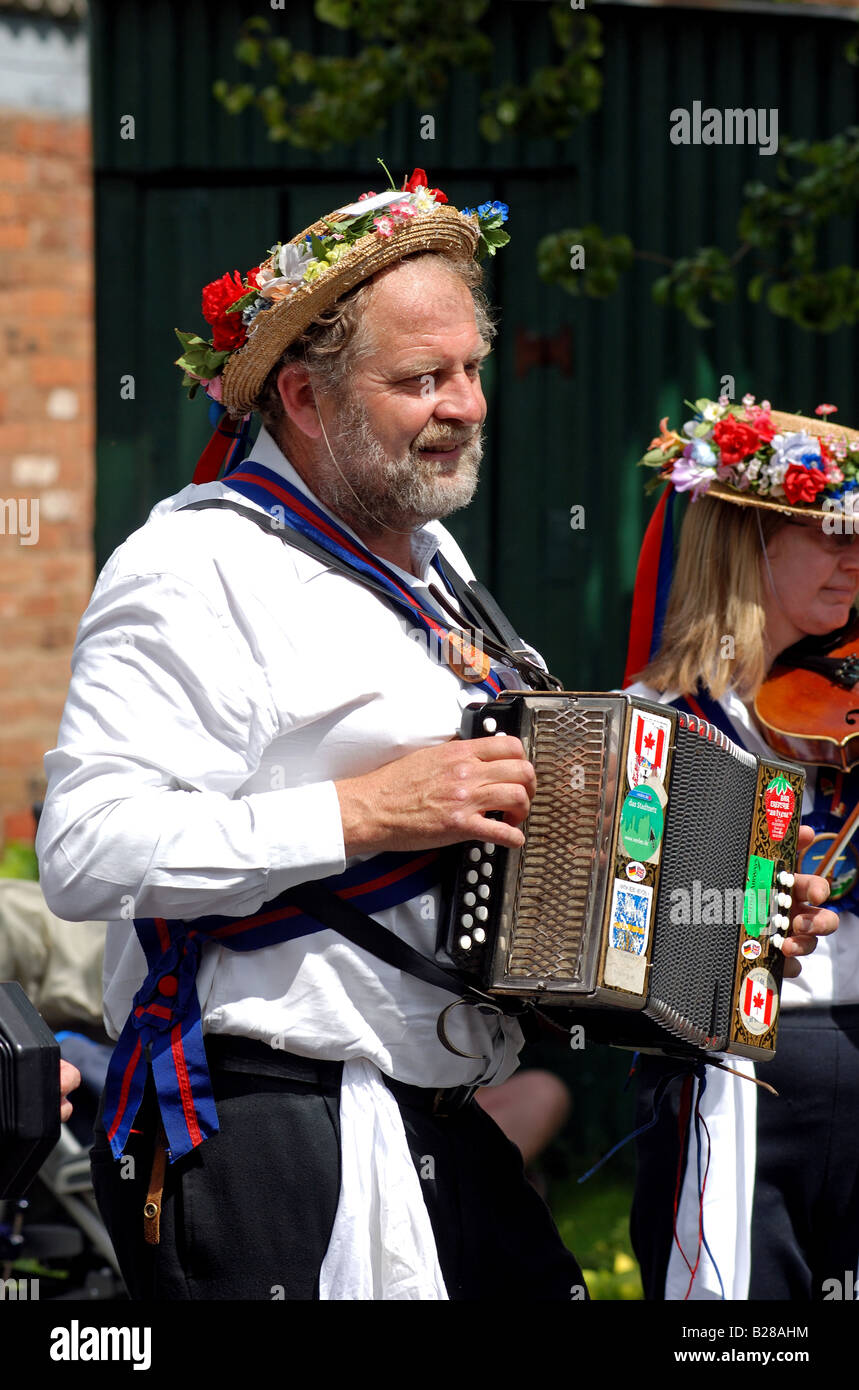 Man wearing traditional costume playing hi-res stock photography and ...