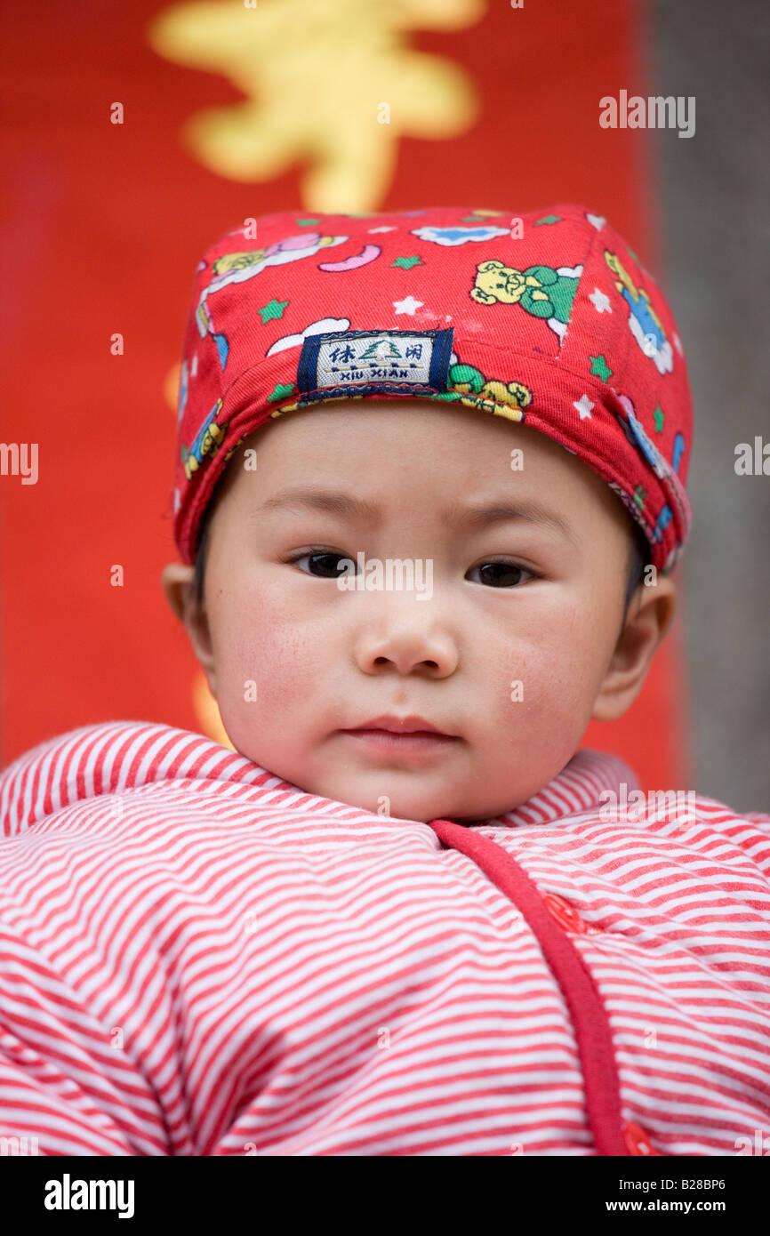 Baby girl in Fuli Old Town Xingping China Stock Photo - Alamy