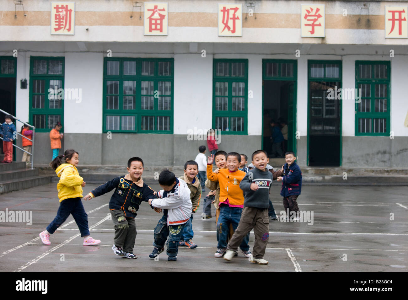 School children playing in playground hi-res stock photography and ...