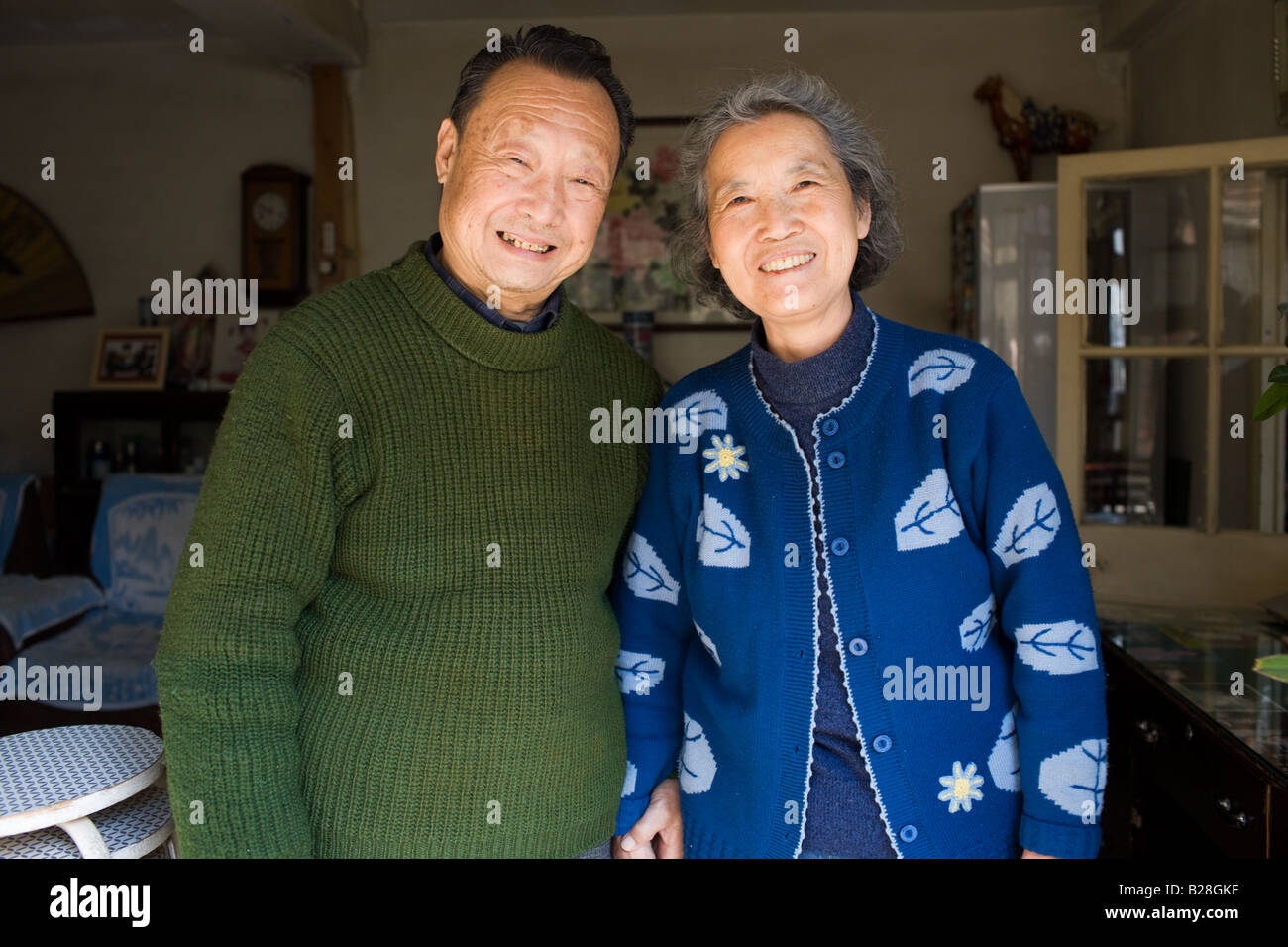 Chinese couple Mr and Mrs Wu in their traditional home in the Hutongs ...