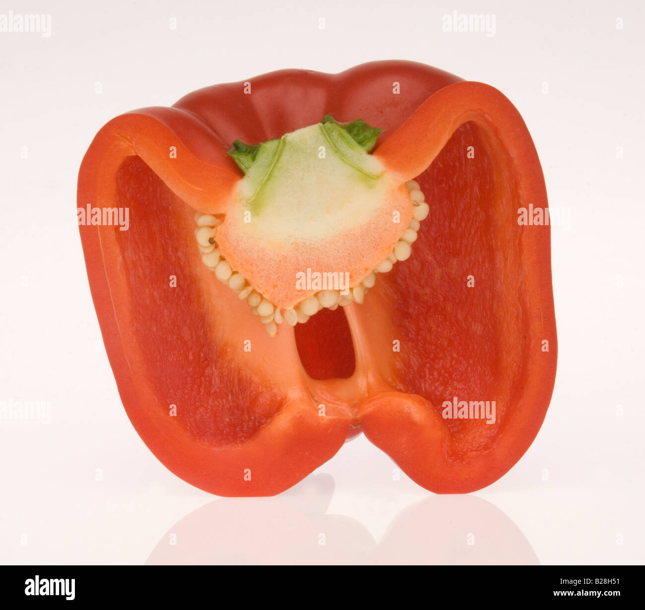 Halved red bell pepper capsicum annum Stock Photo - Alamy