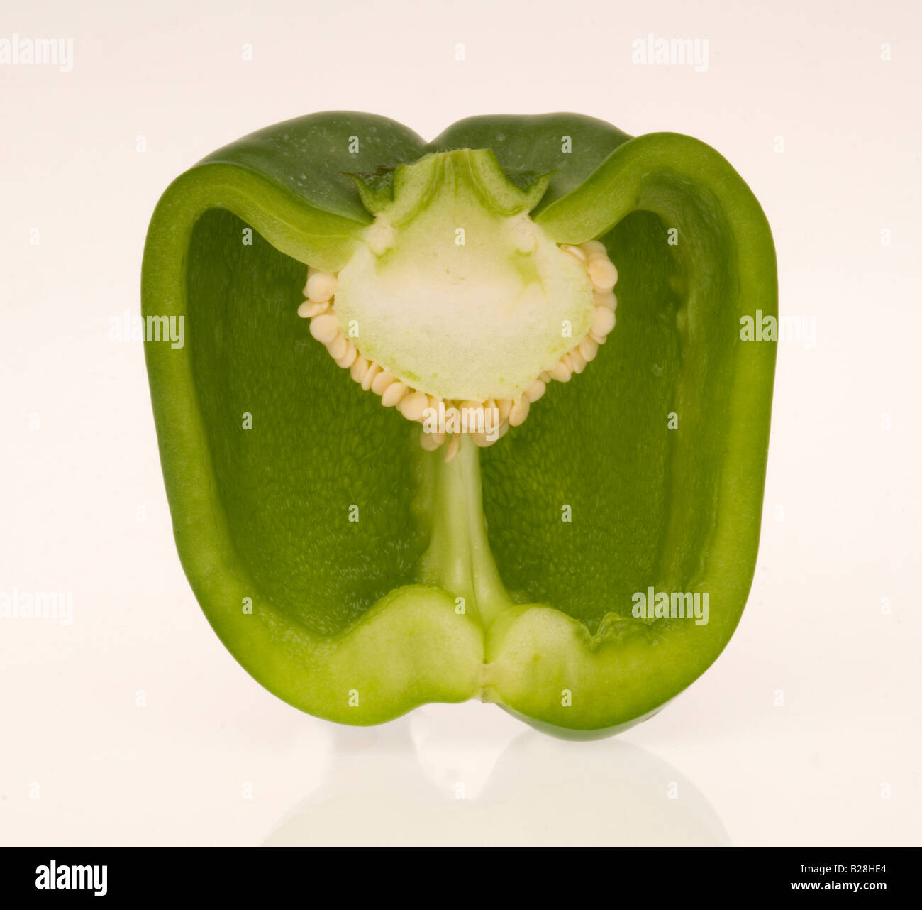 Halved green bell pepper capsicum annum Stock Photo - Alamy