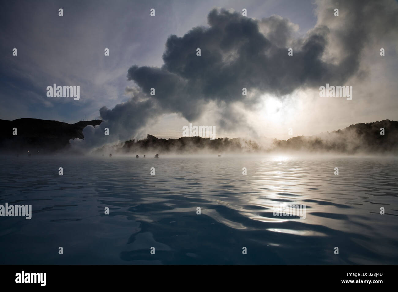 Tourists swimming in the Blue Lagoon, Iceland’s largest tourist ...
