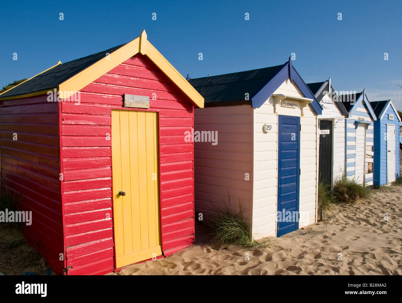 Bright Painted Beach huts Southwold Suffolk Stock Photo - Alamy