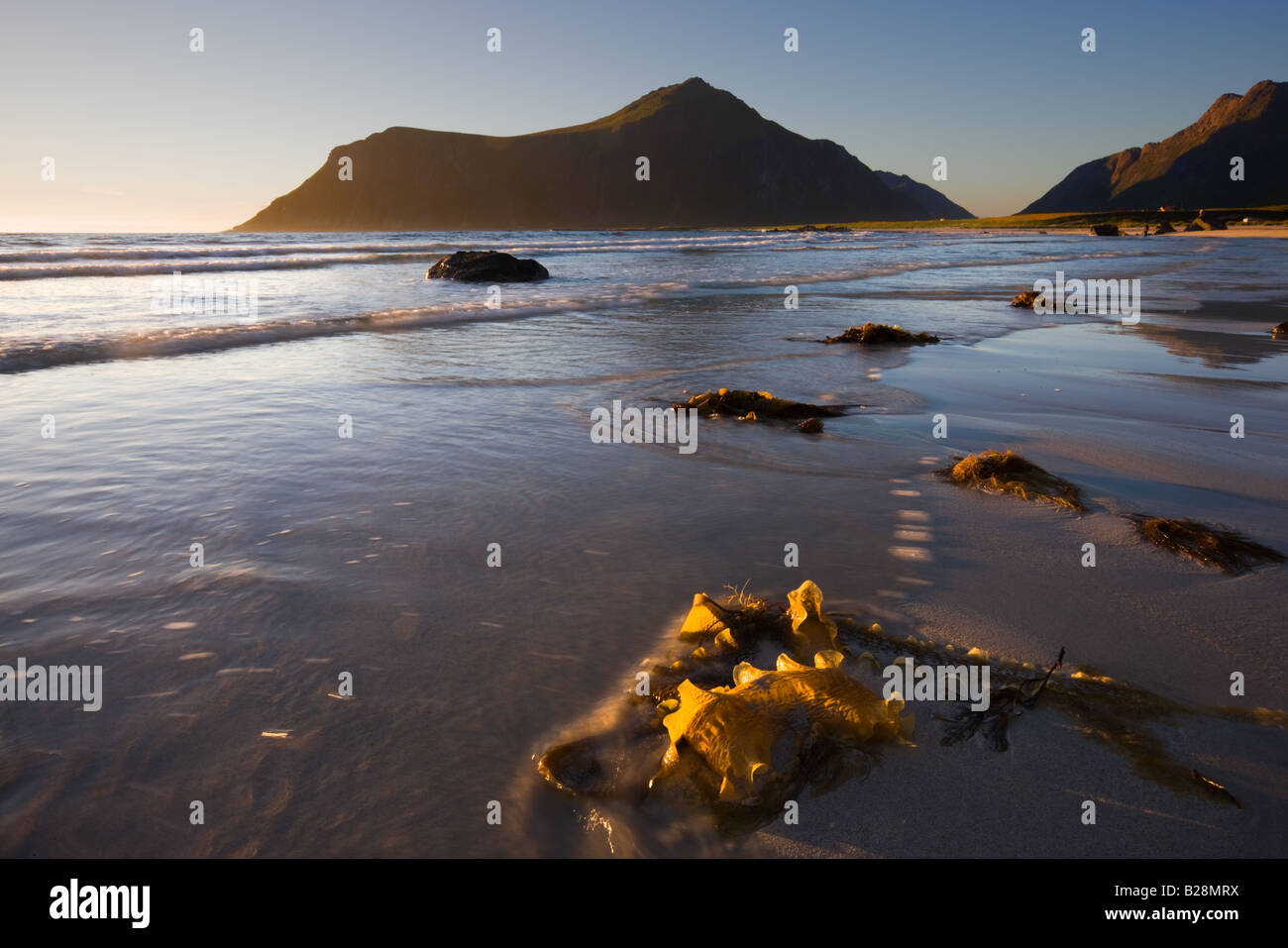 Looking across towards Hestneset from Flakstad beach, Lofoten Islands ...