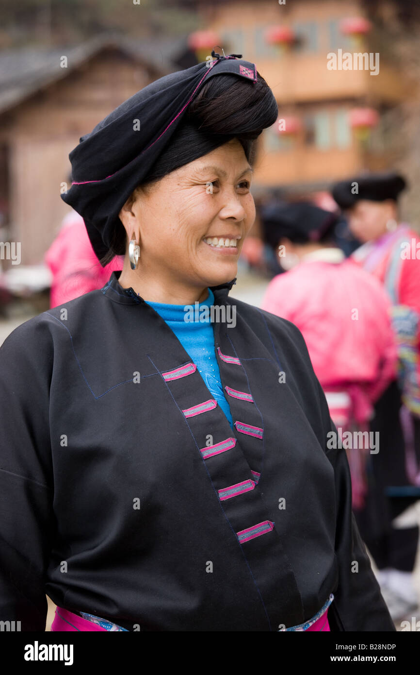 Woman from Yao minority nationality with traditional long hair ...