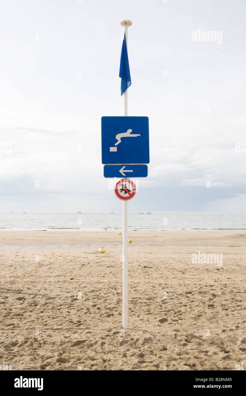Swim sign on beach Stock Photo - Alamy