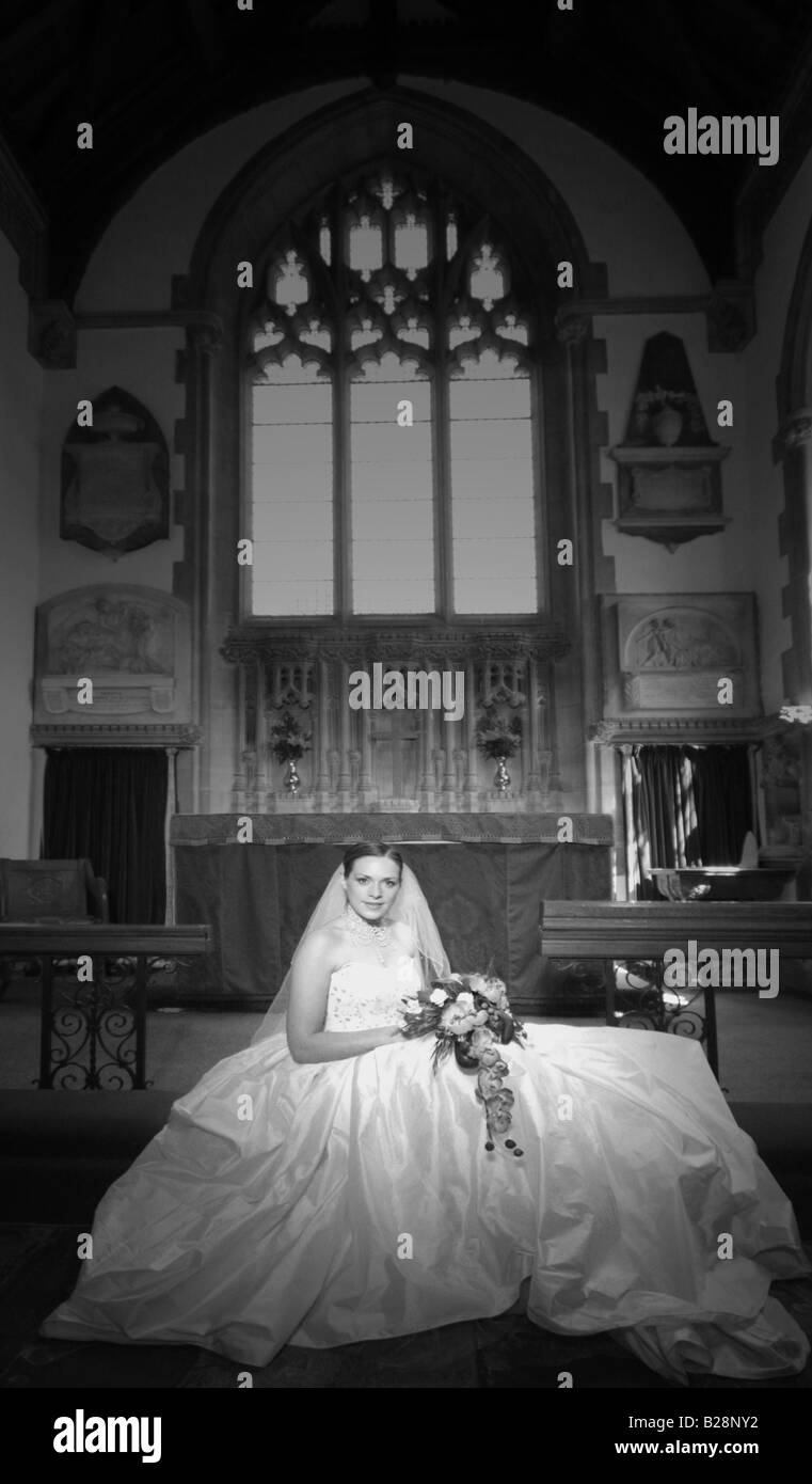 Bride at alter Stock Photo - Alamy