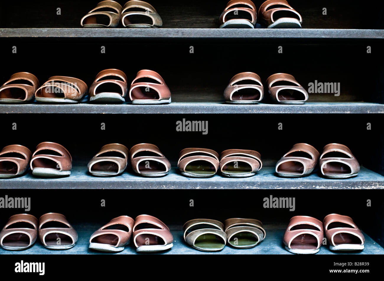 A rack of outdoor slippers in Japan Stock Photo - Alamy