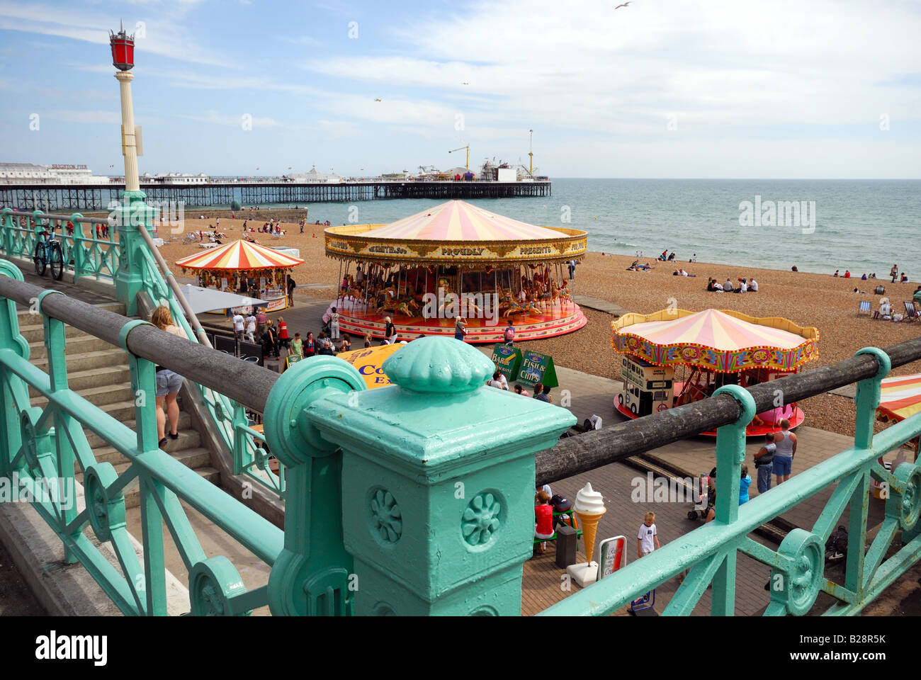 Brighton seafront in summer with pier and funfair in background East ...