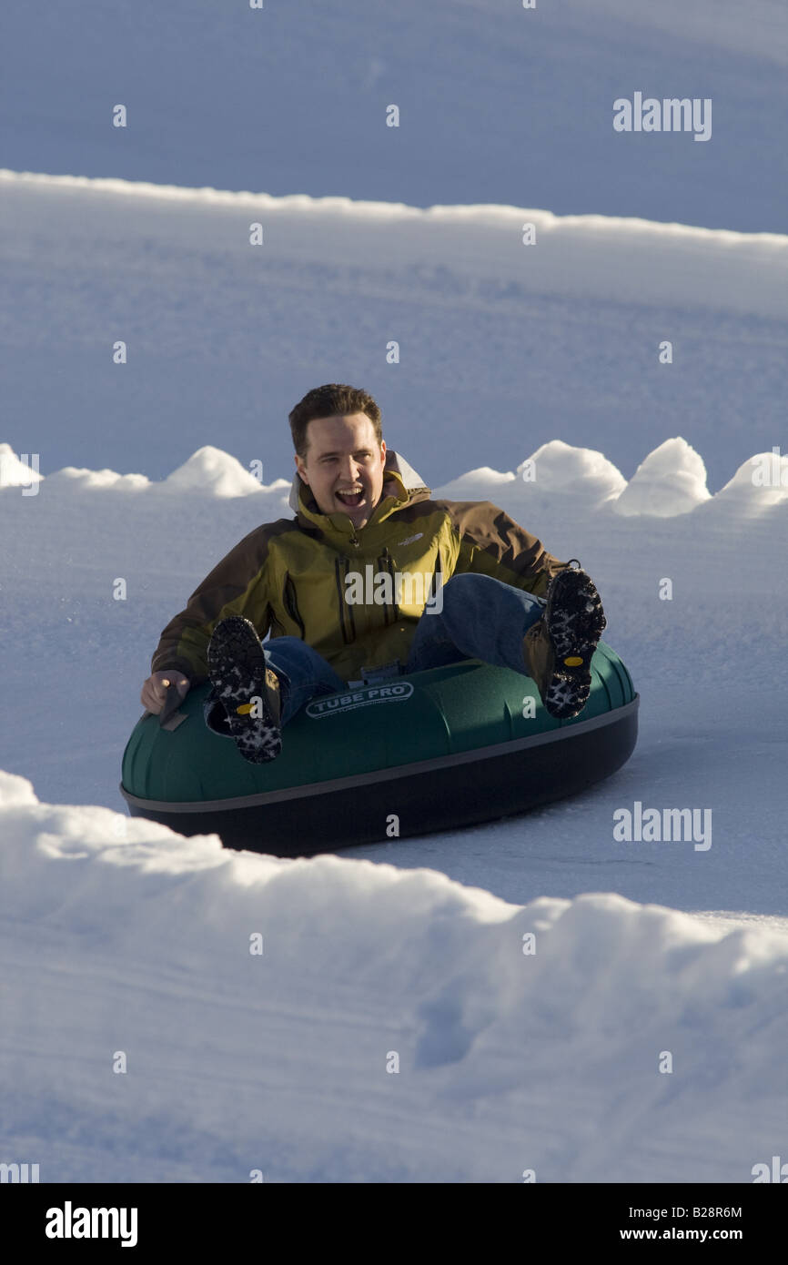 man enjoying a tube ride Whistler British Columbia Canada Stock Photo ...