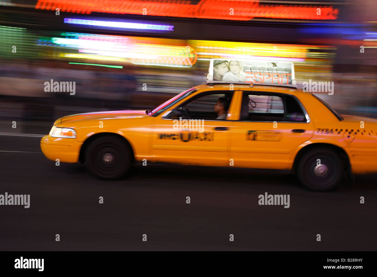 Yellow taxi cab at night with motion blur - New York City, USA Stock ...