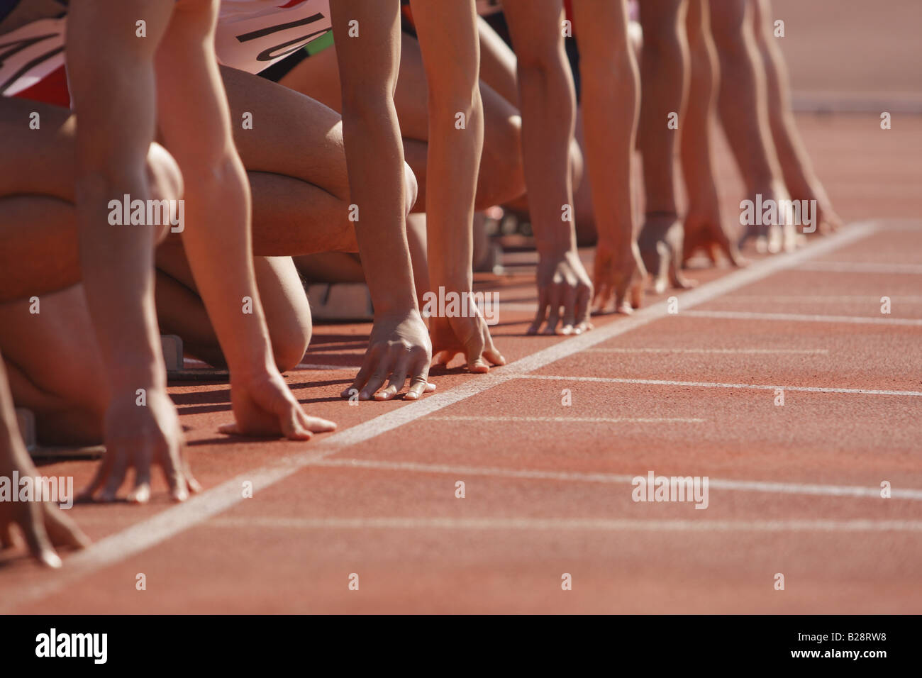 Men runners starting position hi-res stock photography and images - Alamy