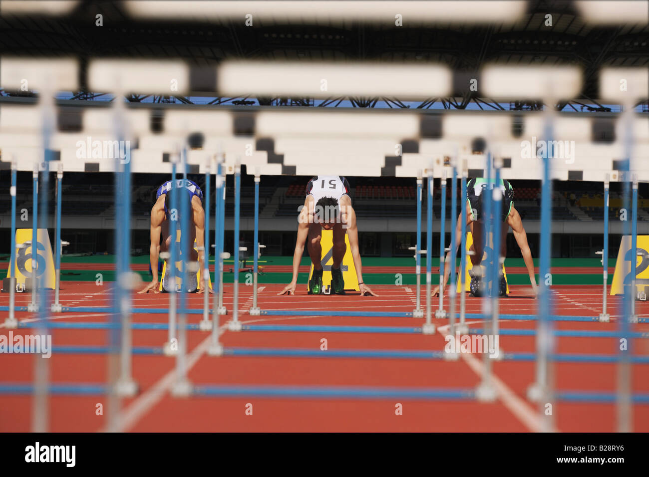 Runners at Starting Line Stock Photo - Alamy