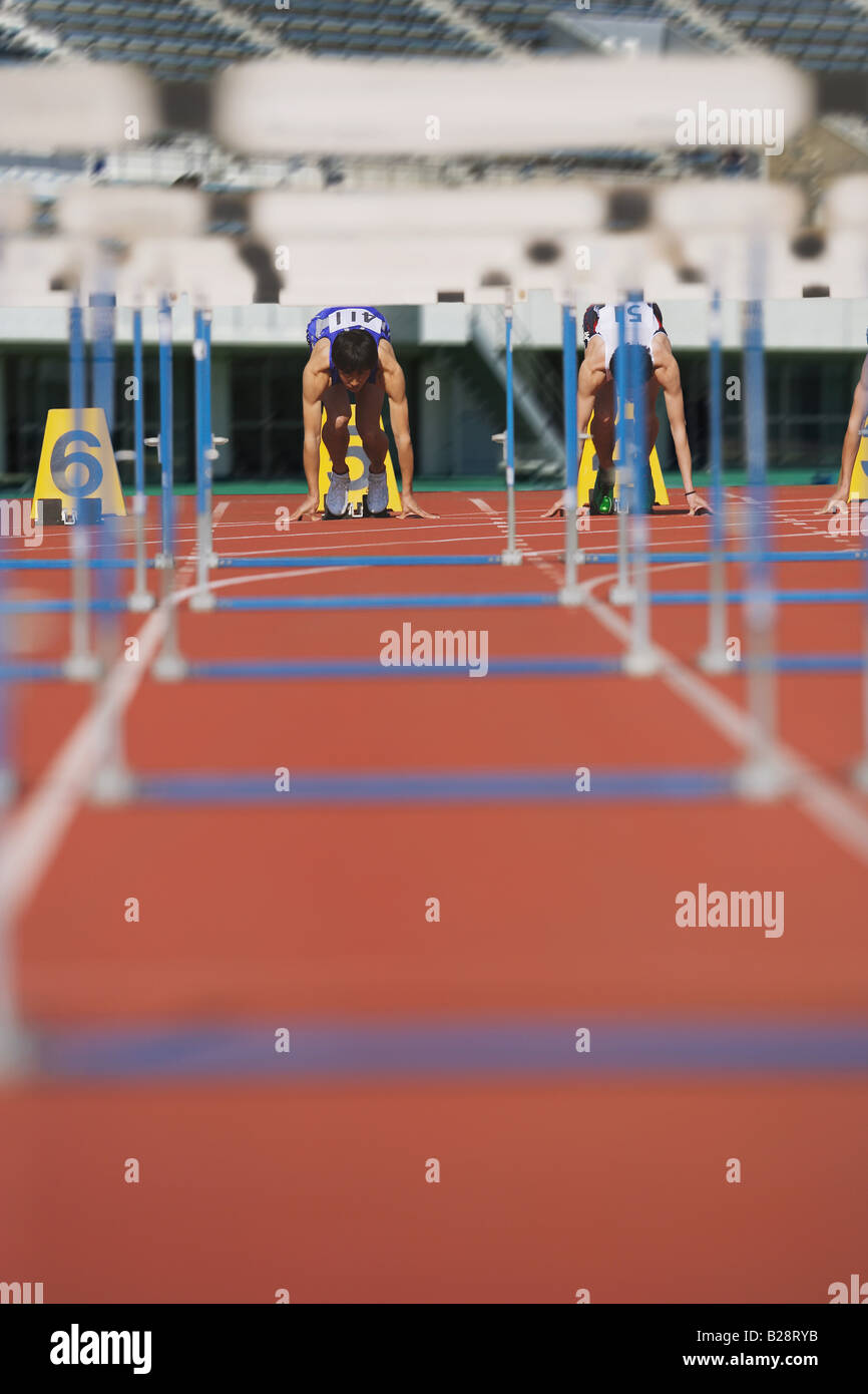 Runners at Starting Line Stock Photo - Alamy