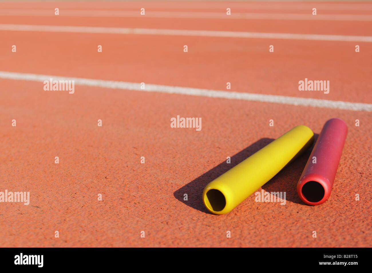 Relay batons hi-res stock photography and images - Alamy