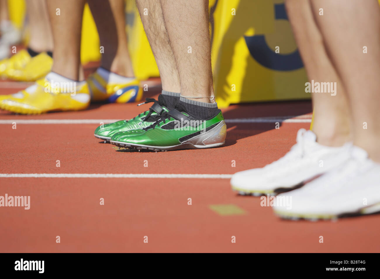 Runners at Starting Line Stock Photo - Alamy