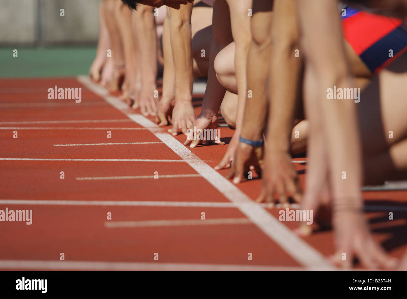 Runners at Starting Line Stock Photo - Alamy