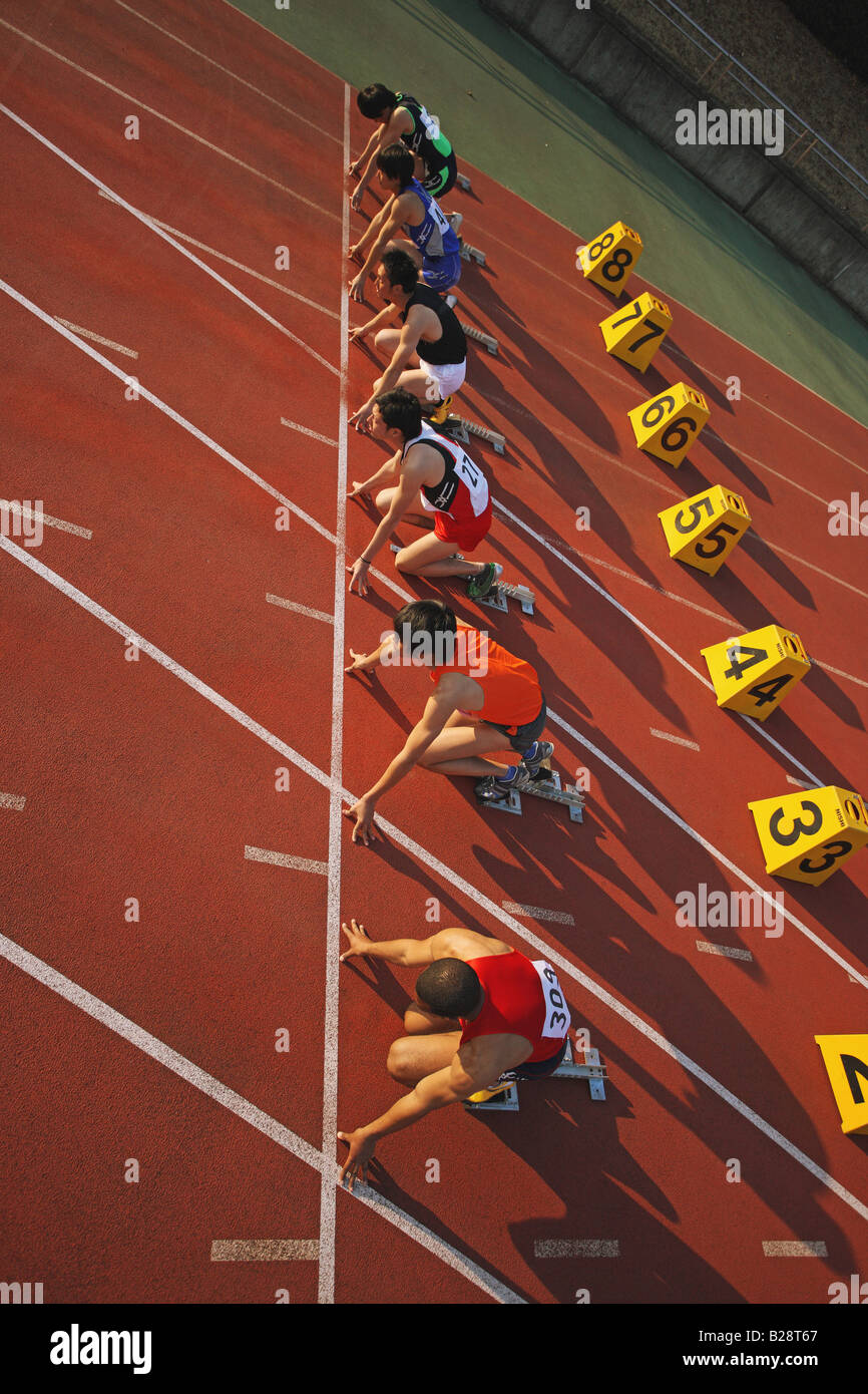 Runners at Starting Line Stock Photo - Alamy