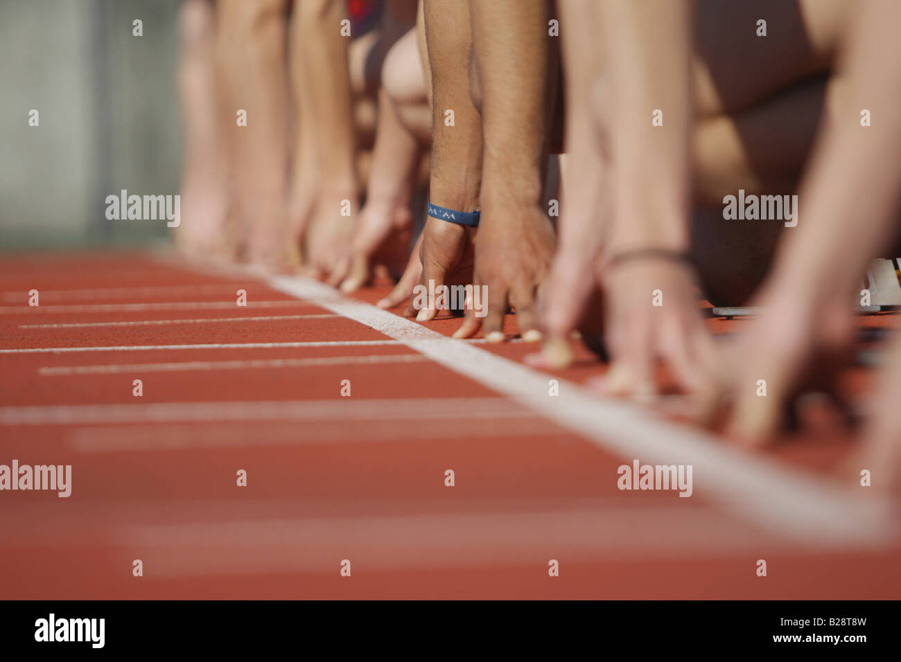 Men runners starting position hi-res stock photography and images - Alamy