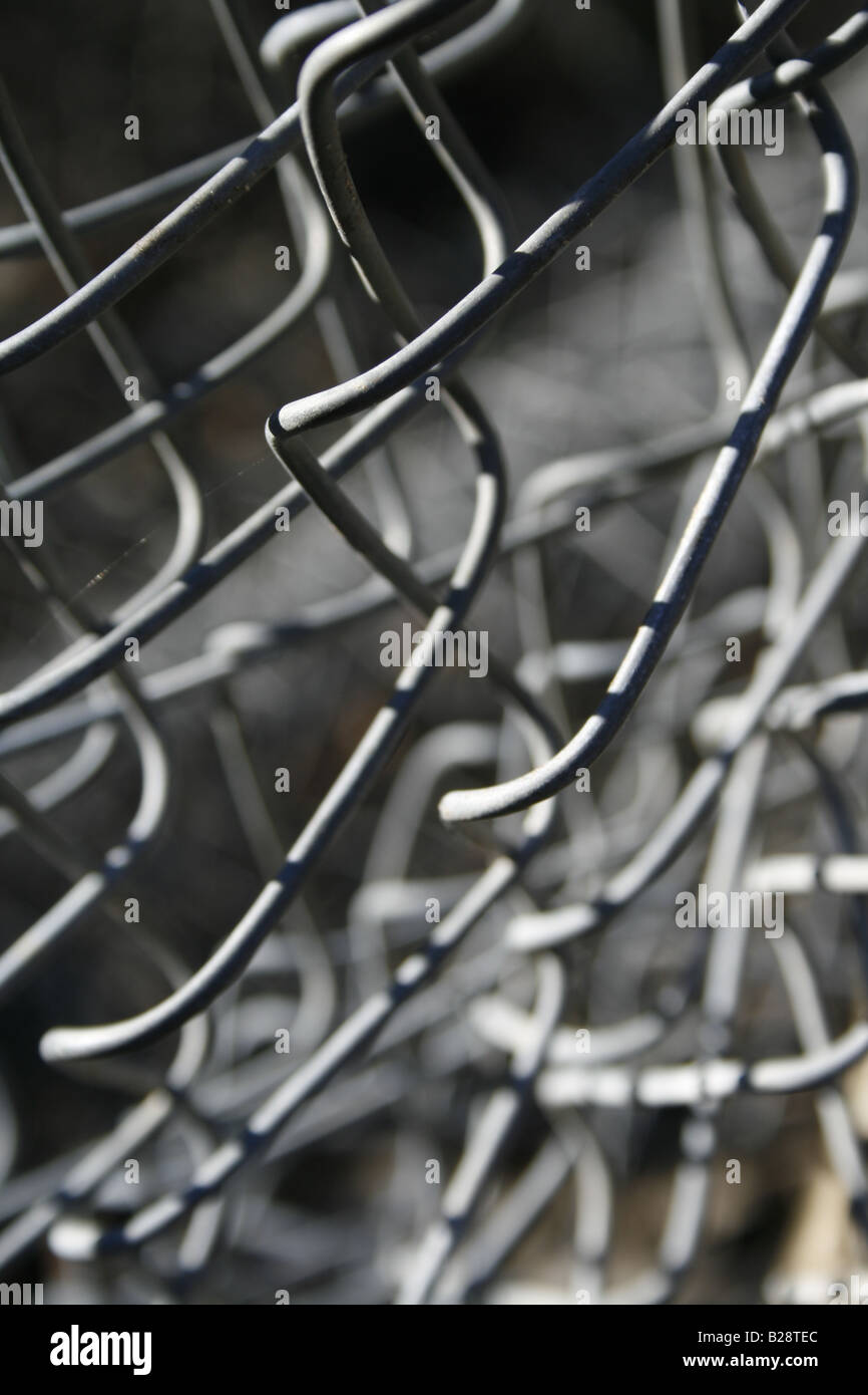 close up of tangled metal wire pattern fence Stock Photo - Alamy