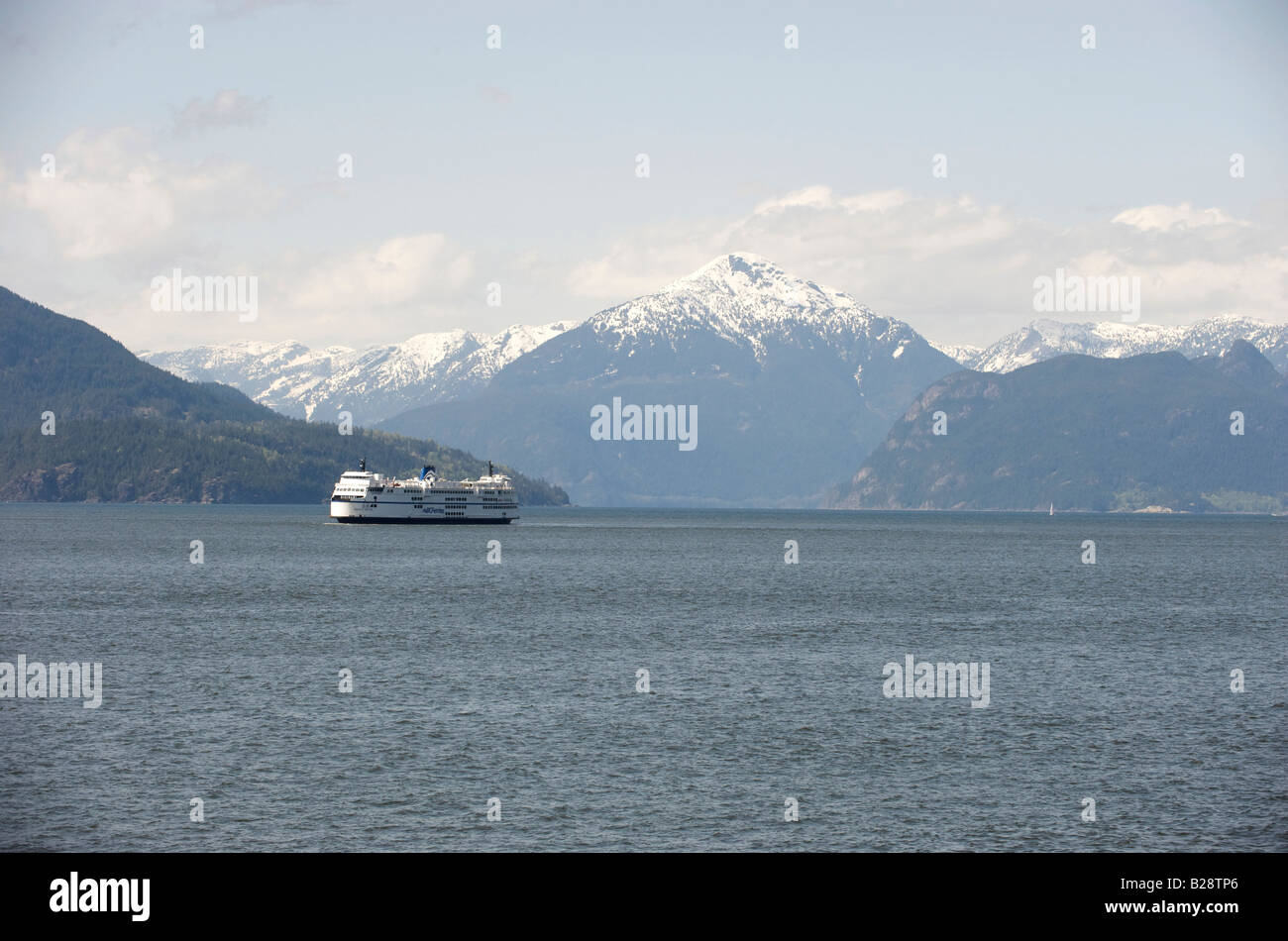 BC Ferries Queen of Oak Bay with Sunshine Coast Mountains behind ...