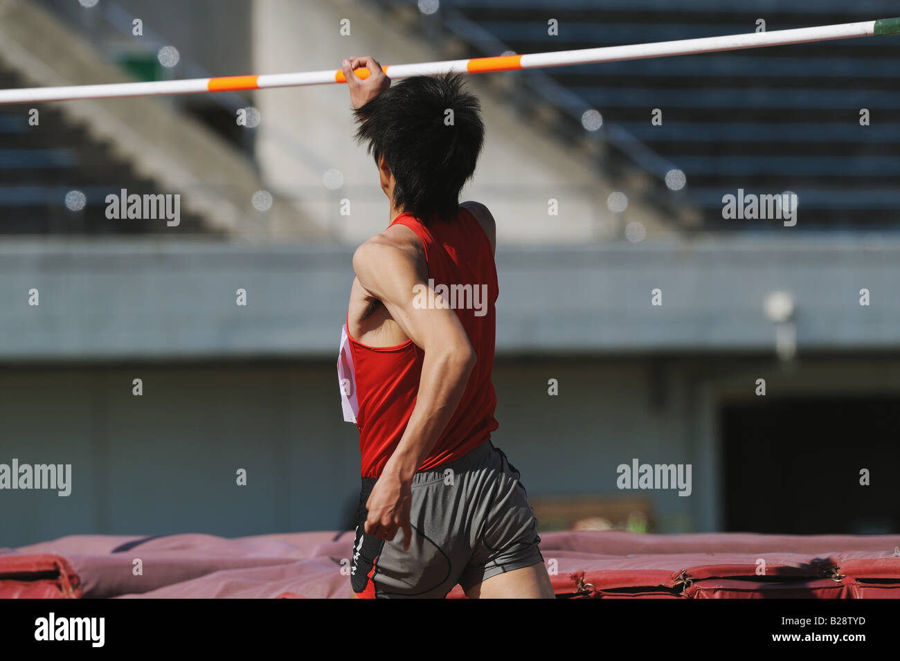 Athlete Preparing to Jump Stock Photo - Alamy