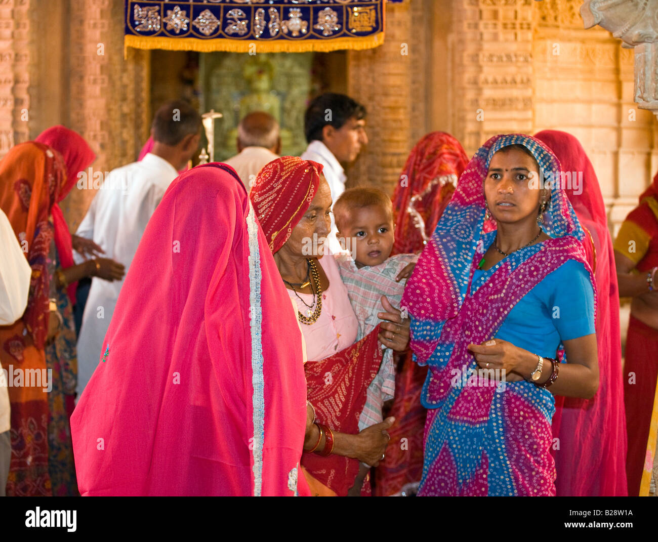 Indian pilgrims inside a JAIN TEMPLE in the JAISALMER FORT RAJASTHAN ...