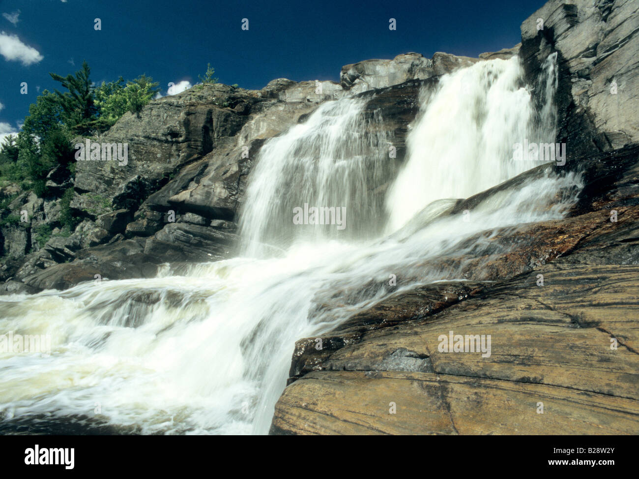 Waterfalls occur where a stream or river cascades over a ridge of ...