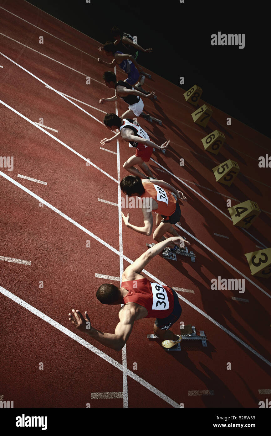 Runners Starting Off Stock Photo - Alamy