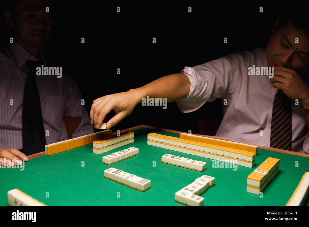 Mahjong players hi-res stock photography and images - Alamy