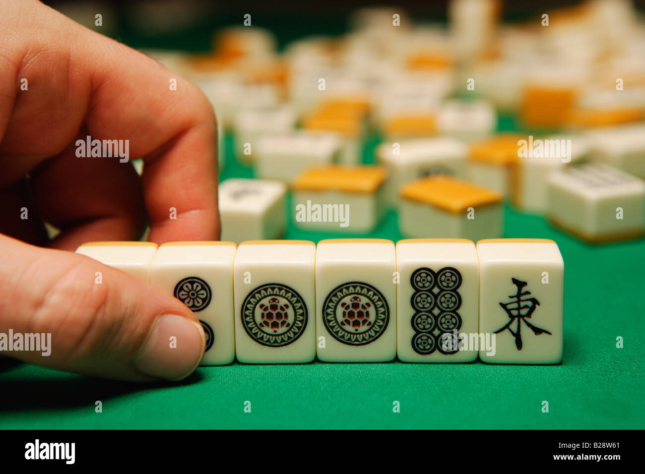 Chinese men playing mahjong hi-res stock photography and images - Alamy