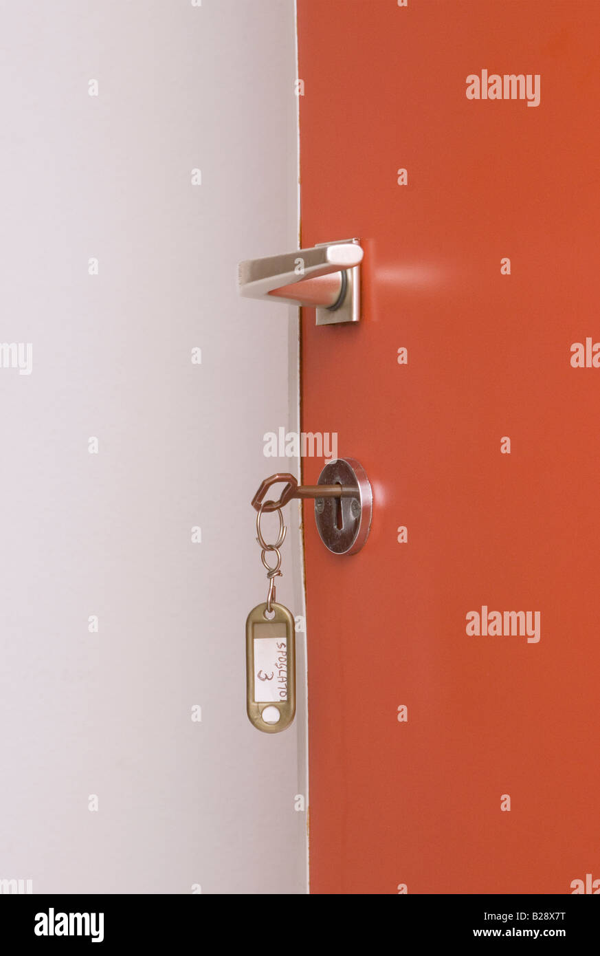 red door and key Stock Photo - Alamy