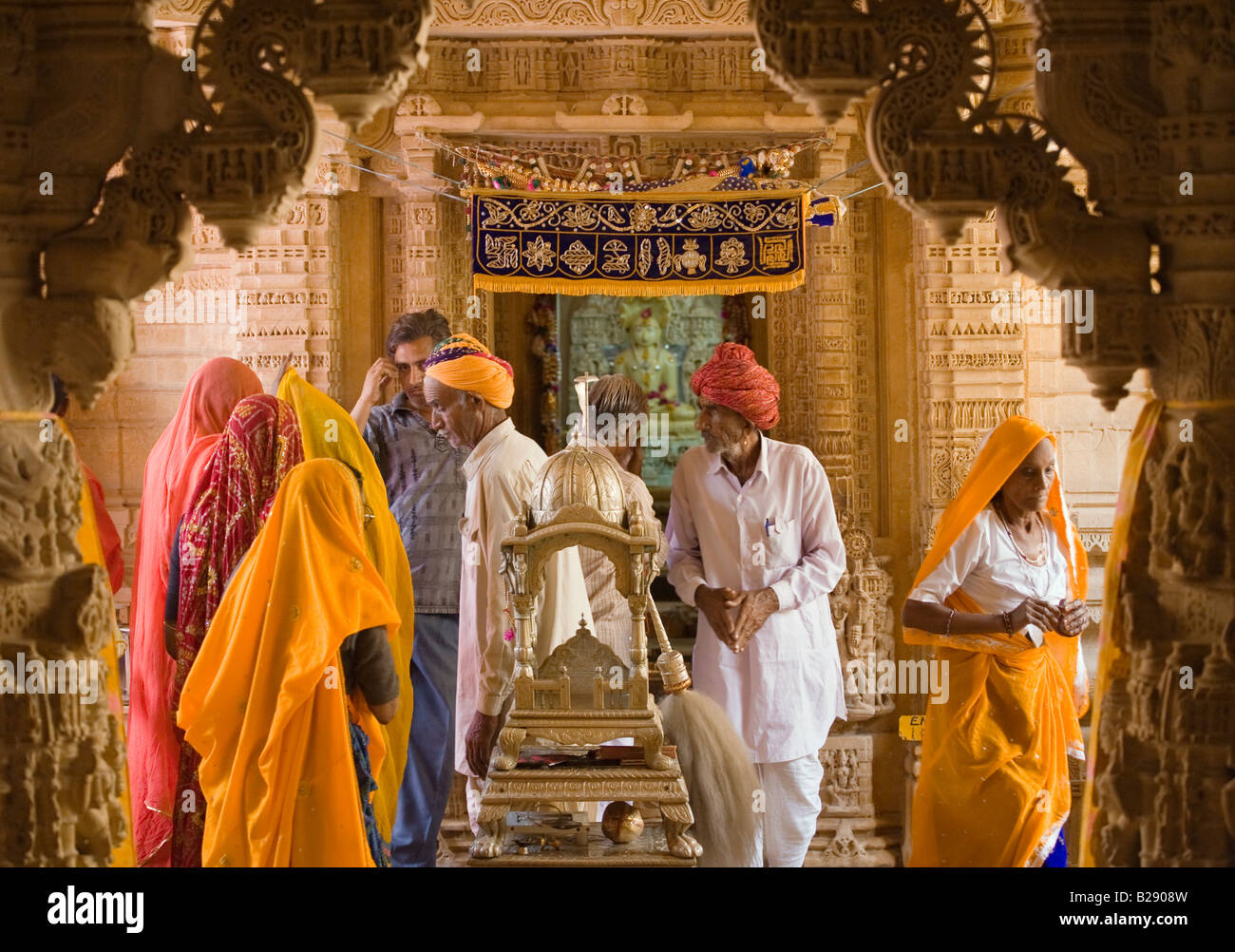 Indian pilgrims inside a JAIN TEMPLE in the JAISALMER FORT RAJASTHAN ...