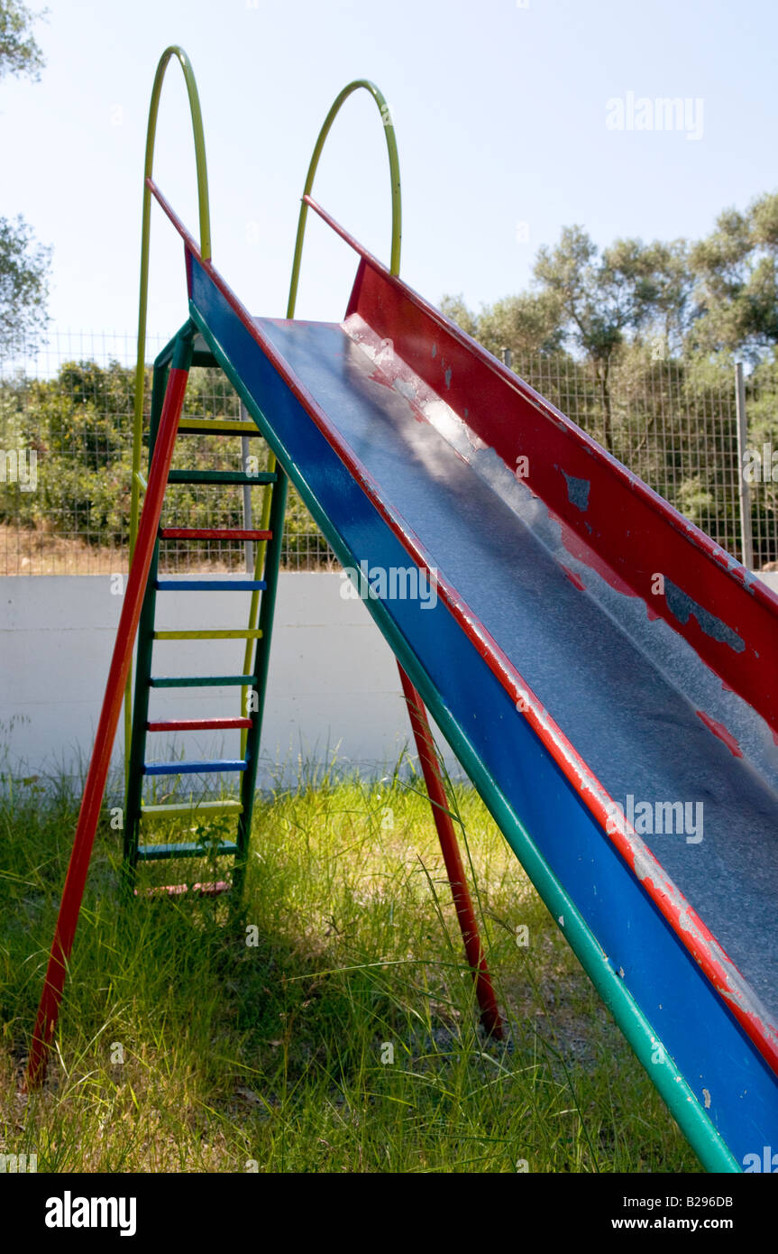 Chute in children's playground Stock Photo - Alamy
