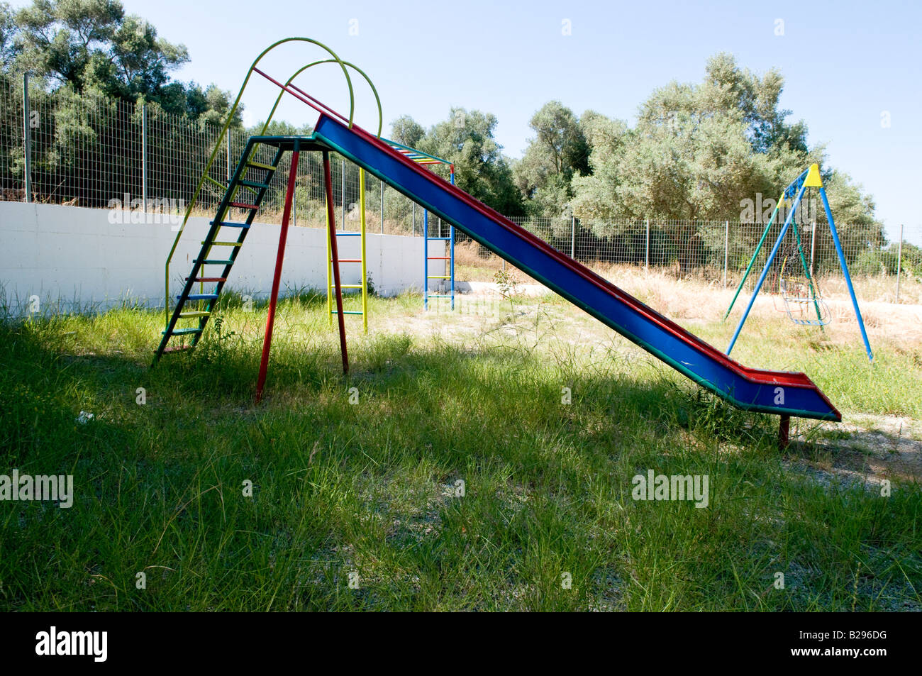 Chute in children's playground Stock Photo - Alamy
