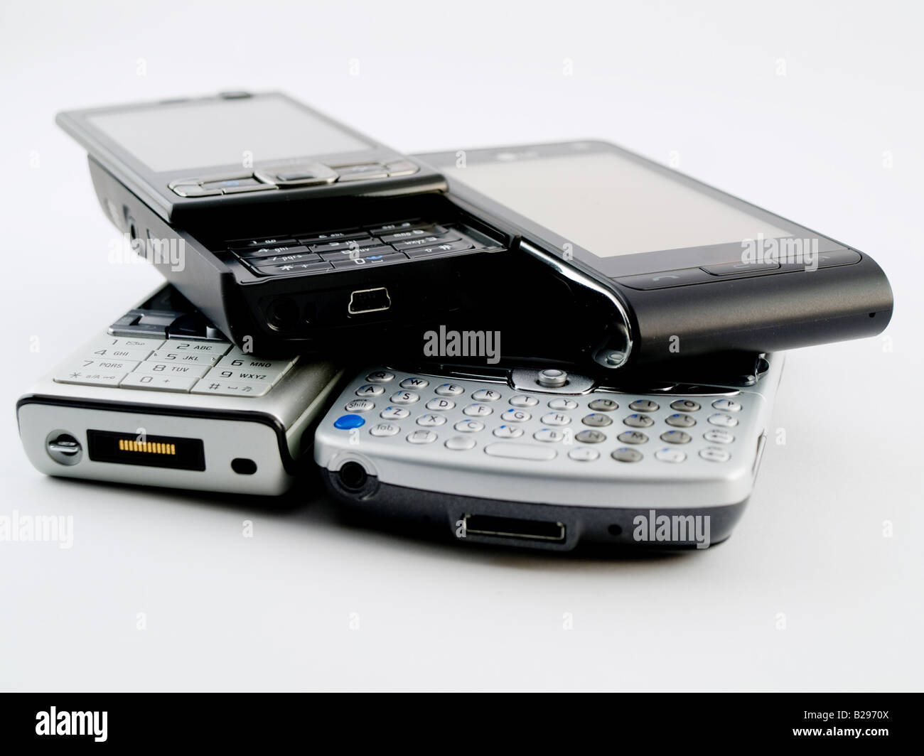 Stack Pile of Several Modern Mobile Phones PDA Cell Handheld Units ...