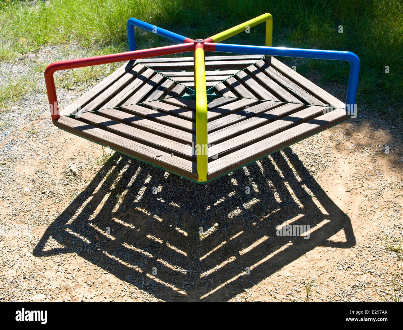 Roundabout in childrens playground High Resolution Stock Photography ...